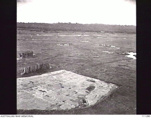 MANGGAR, BORNEO, 9 JULY 1945. MANGGAR AIRSTRIP LOOKING NORTH WEST FROM ...