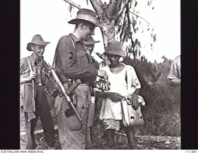 BALIKPAPAN, BORNEO, 10 JULY 1945. LANCE CORPORAL R CORDAIY, FIELD ...
