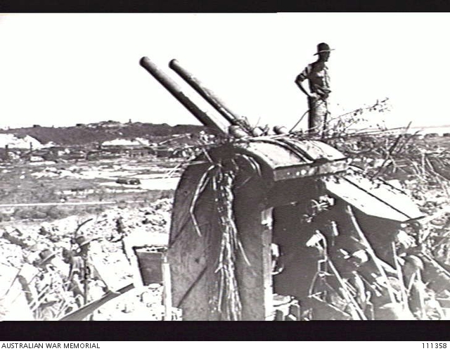 BALIKPAPAN AREA, BORNEO, 13 JULY 1945. A JAPANESE TWIN BARREL 127MM ...