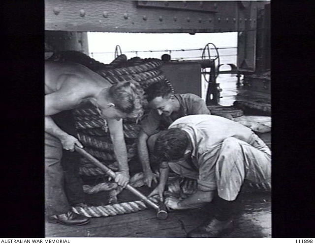 AT SEA, BORNEO AREA. 1945-06-27. ABLE SEAMAN (AB) MADDEN (1), LEADING ...