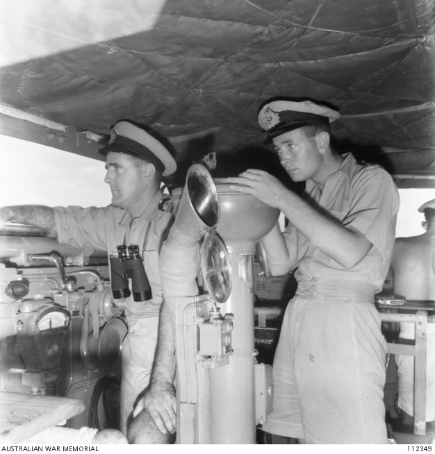 AT SEA. 1945-06-19. LIEUTENANT COMMANDER C. M. HUDSON, RAN NAVIGATING ...