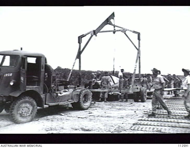 TARAKAN ISLAND, 30 JULY 1945. A KITTYHAWK AIRCRAFT OF 80 SQUADRON, RAAF ...