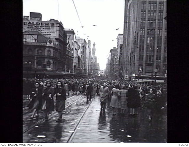 MELBOURNE, VIC. 15 AUGUST 1945. A SECTION OF THE CROWD OF PEOPLE ...