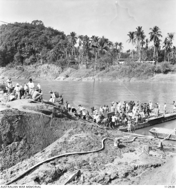 BEAUFORT AREA, BORNEO 1945-07-31. FERRY BERTHING AT THE NEW RAMP ON THE ...