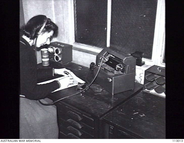 MELBOURNE, VIC. 1945-08-14. AN OPERATOR OF THE DEPARTMENT OF ...