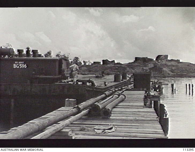 TARAKAN ISLAND. 1945-08-01. A SECTION OF THE OIL JETTY AT LINGKAS BEACH ...