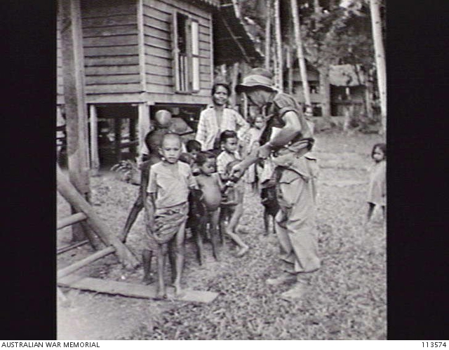PAPAR, BORNEO. 1945-08-01. CORPORAL C. ASPINALL, BRITISH BORNEO CIVIL ...