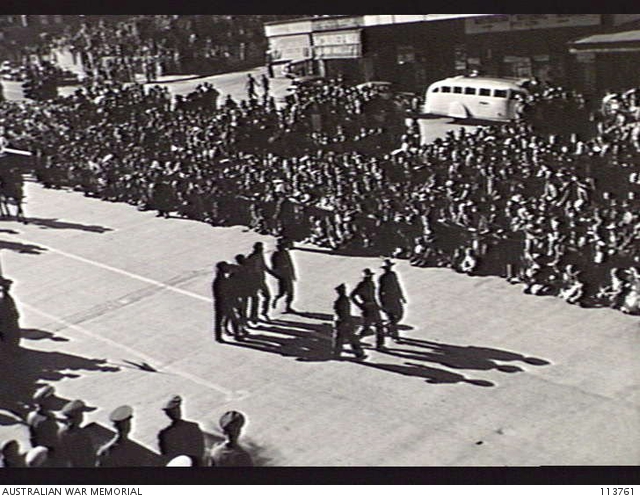 BRISBANE, QLD. 1945-08-16. APPROXIMATELY 10,000 MEN AND WOMEN OF THE ...