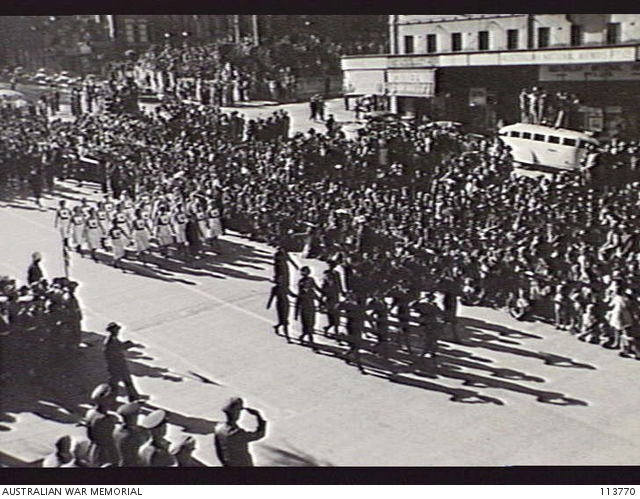 BRISBANE, QLD. 1945-08-16. APPROXIMATELY 10,000 MEN AND WOMEN OF THE ...
