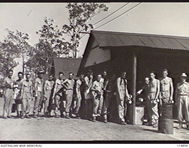 WINNELLIE, NT. 1945-09-05. MEMBERS OF A COMPANY, 12/40TH INFANTRY ...
