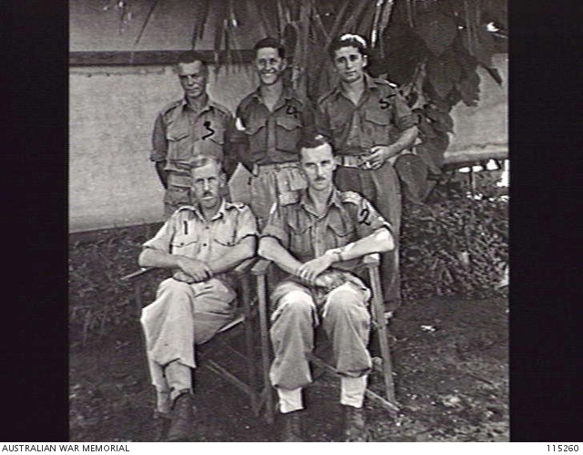 MOROTAI. 1945-08-30. MEMBERS OF 1 CORPS OPERATIONS REPORT TEAM. IDENTIFIED PERSONNEL ARE: MAJOR ...
