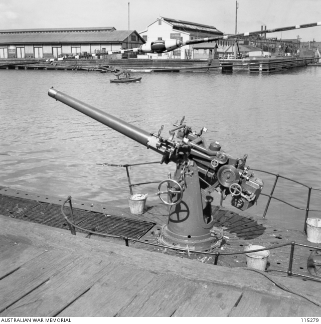 MELBOURNE, VIC. 1945-09-12. THE 3-INCH GUN OF THE ROYAL NAVY SUBMARINE ...