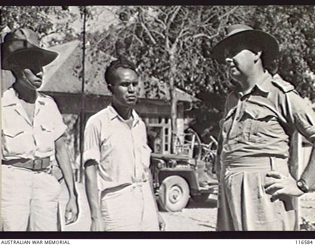 KOEPANG, TIMOR. 1945-09-19. CAPTAIN P. P. MCCABE, INTELLIGENCE OFFICER ...
