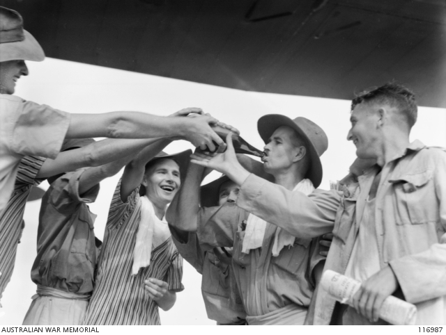 SINGAPORE. 1945-09-09. MEMBERS OF 8TH AUSTRALIAN DIVISION, EX-PRISONERS ...
