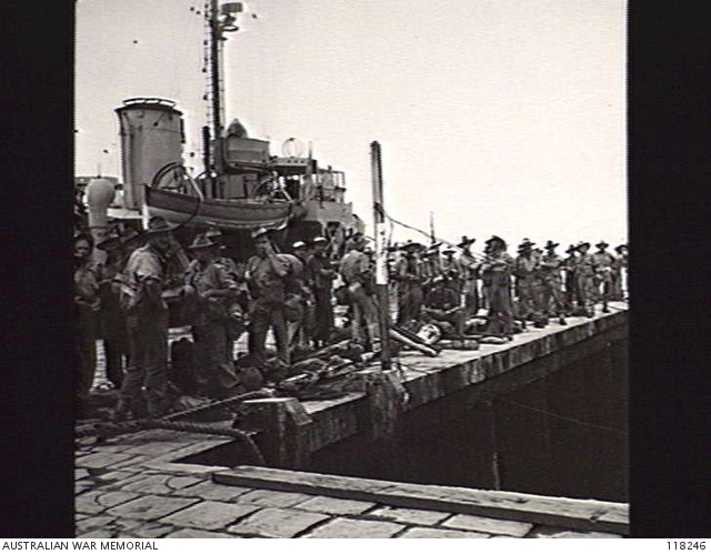 AMBON ISLAND. 1945-09-22. TROOPS OF 233RD LIGHT AID DETACHMENT WAITING ...