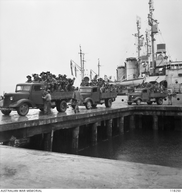 AMBON ISLAND. 1945-09-22. PERSONNEL OF 64TH INFANTRY BATTALION LEAVING ...