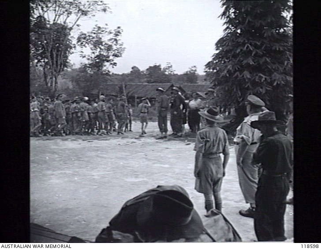 KUCHING, SARAWAK, BORNEO. 1945-09-12. KUCHING FORCE. AFTER A PARADE IN ...