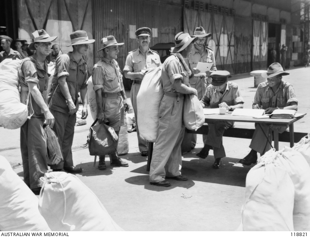 SINGAPORE WHARF. 1945-10-06. EMBARKATION FOR AUSTRALIA OF 8TH DIVISION ...