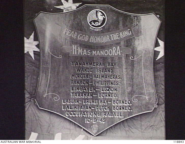 HMAS MANOORA 1945-10-09. THE SHIP'S CREST SHIELD LISTING ITS BATTLE ...