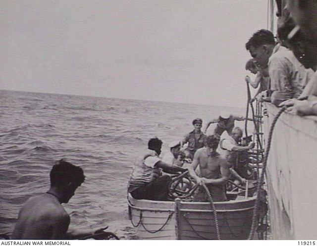 CORAL SEA, BOUGAINVILLE REEF, 1945-11-O5. MEMBERS OF THE CREW OF THE ...