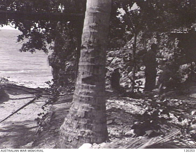 KALAPA, DUTCH TIMOR 1945-11-03. TIMFORCE. AUSTRALIANS LOOK INTO A CAVE ...