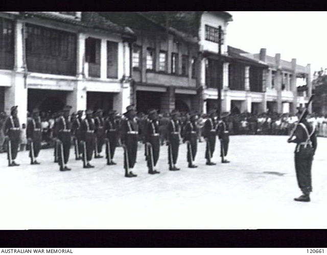 KUCHING, SARAWAK, BORNEO 1945-09-29. A GUARD DETAIL FROM HEADQUARTERS ...