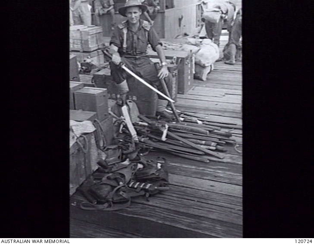 KUCHING, SARAWAK, BORNEO 1945-09-22. KUCHING FORCE. NX67530 CAPTAIN G ...