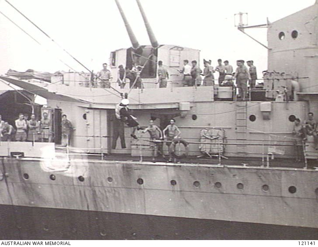 AT SEA OFF JAPAN. 1945-07-30. NAVY PERSONNEL BEING TRANSFERRED FROM ...