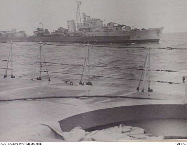 AT SEA OFF JAPAN, 1945-08-09. A ROYAL NAVY DESTROYER PHOTOGRAPHED FROM ...
