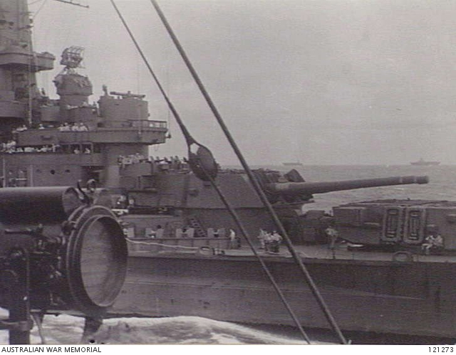 AT SEA OFF JAPAN, 1945-08-01. HMAS NORMAN PASSING A UNITED STATES NAVY ...