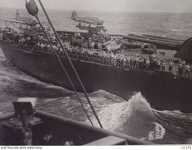 AT SEA OFF JAPAN, 1945-08-01. HMAS NORMAN PASSING A UNITED STATES NAVY ...