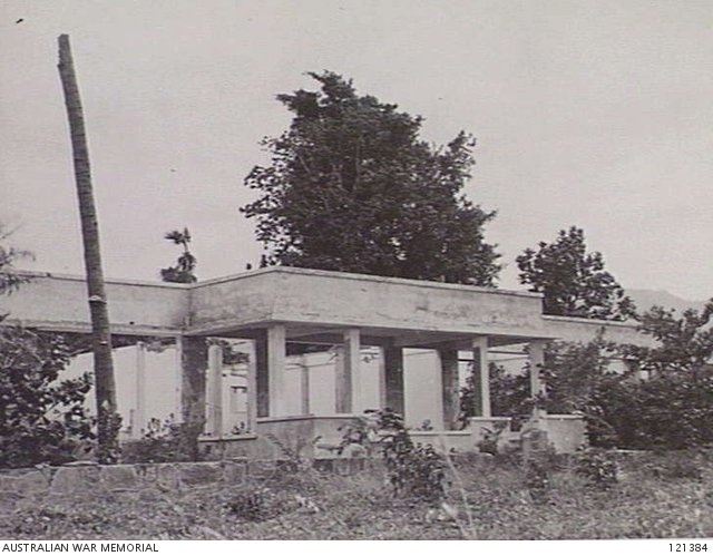 DILI, PORTUGUESE TIMOR 1945-12-24. THE RUINS OF THE ASIA INVESTMENT ...