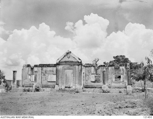 SAME, PORTUGUESE TIMOR 1945-12-16. THE BOMB DAMAGED HOSPITAL ...