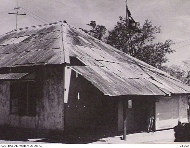 KOEPANG, DUTCH TIMOR 1945-11-29. THE AUSTRALIAN FLAG FLIES WITH THAT OF ...