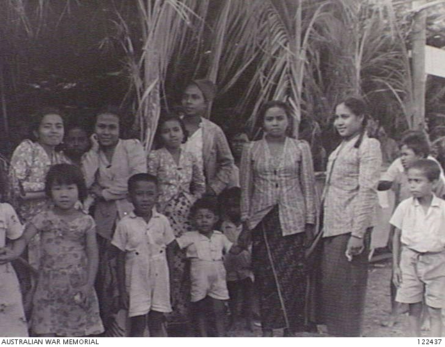 AIR NONA, DUTCH TIMOR 1945-11-14. TIMFORCE. NATIVES AT A FESTIVAL ...