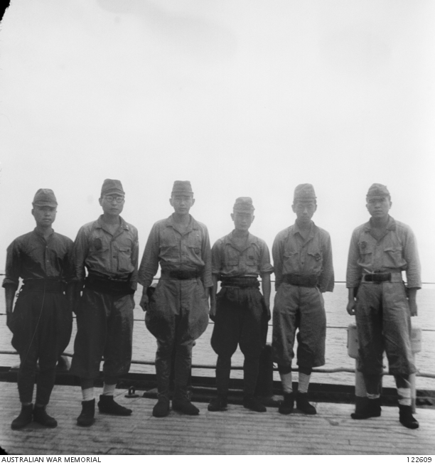 AT SEA, TALAUD GROUP 1945-11-03. LEFT TO RIGHT: FIRST LIEUTENANT (1ST ...
