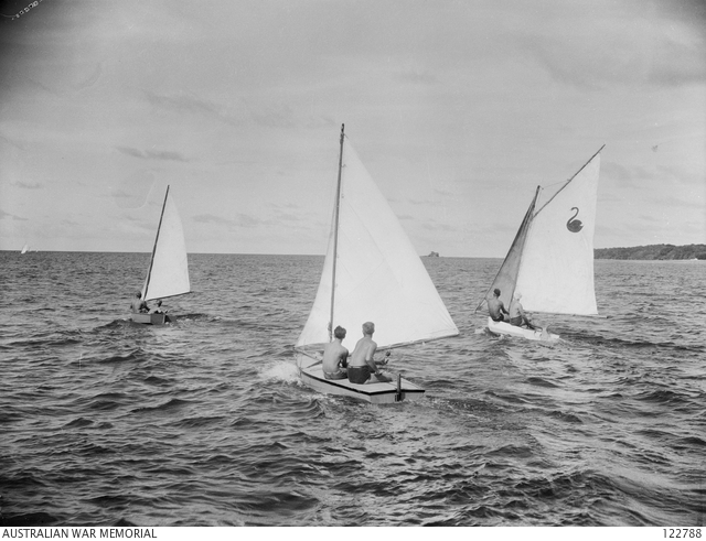 Labuan, North Borneo. 1945-12-05. Three small sailing craft taking part ...