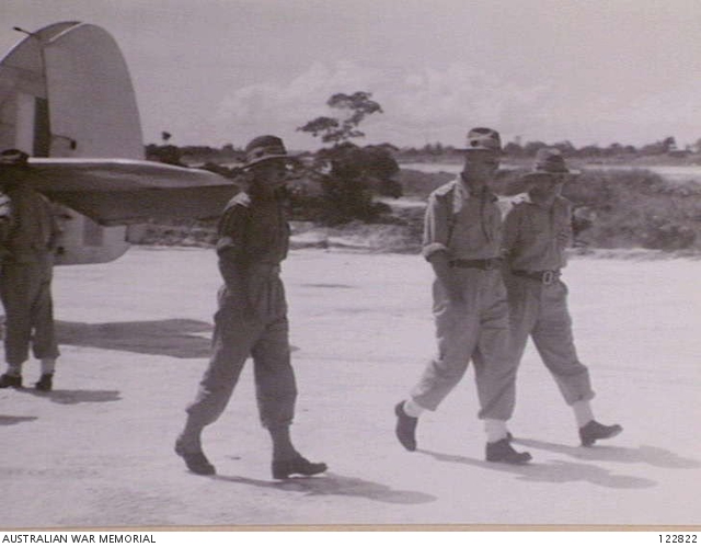 LABUAN ISLAND, NORTH BORNEO 1945-12-07. RIGHT: MAJOR GENERAL E. J ...