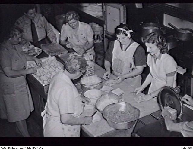 SYDNEY, NSW 1945-11-29. KITCHEN STAFF PREPARING SANDWICHES AT THE ...
