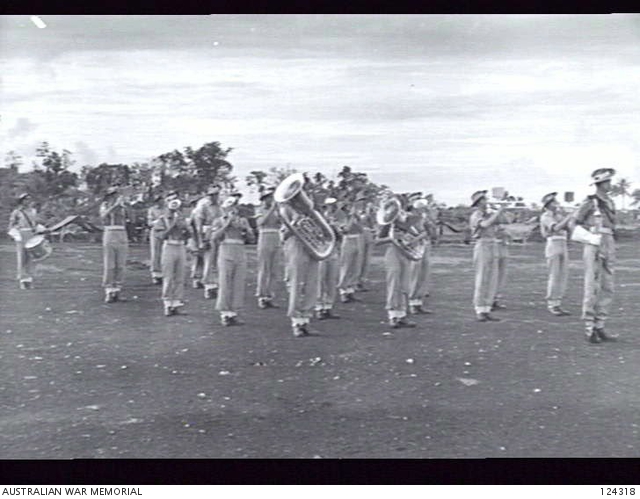MOROTAI, BORNEO 1946-01-19. THE BATTALION BAND PLAYING DURING THE MARCH ...