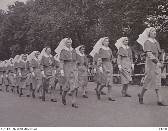 MELBOURNE, VIC 1945-11-29. A COMPANY OF NURSES MARCHING OFF FROM THE ...