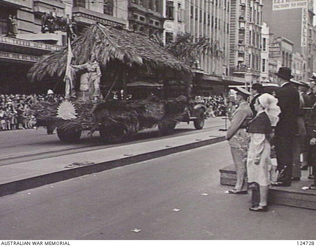 MELBOURNE, VIC 1945-11-29. A FLOAT DEPICTING THE WORK OF NURSES IN THE ...