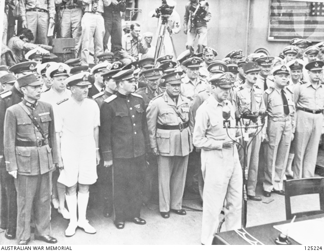 General Douglas Macarthur at the microphone during the signing of the ...