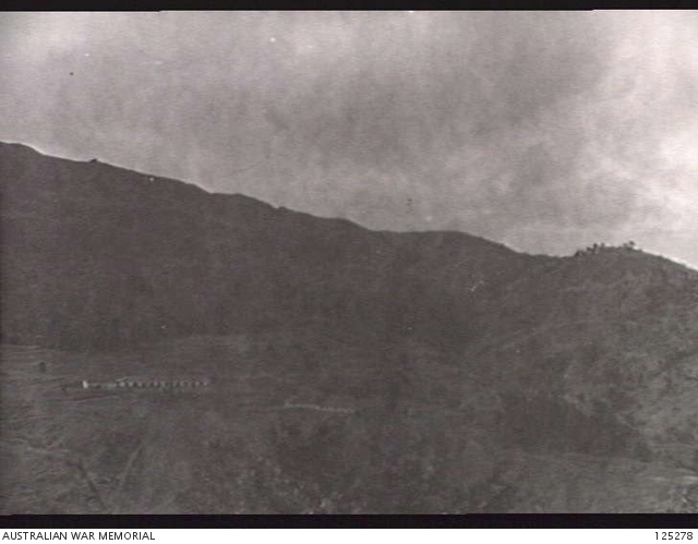 MAUBISSE, PORTUGUESE TIMOR. 1946-01-22. THE BARRACKS IN THE FOREGROUND ...