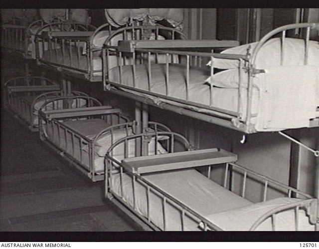 SYDNEY, NSW. 1946-02-05. A ROW OF COTS IN WARD C5 OF THE 2/1ST HOSPITAL ...