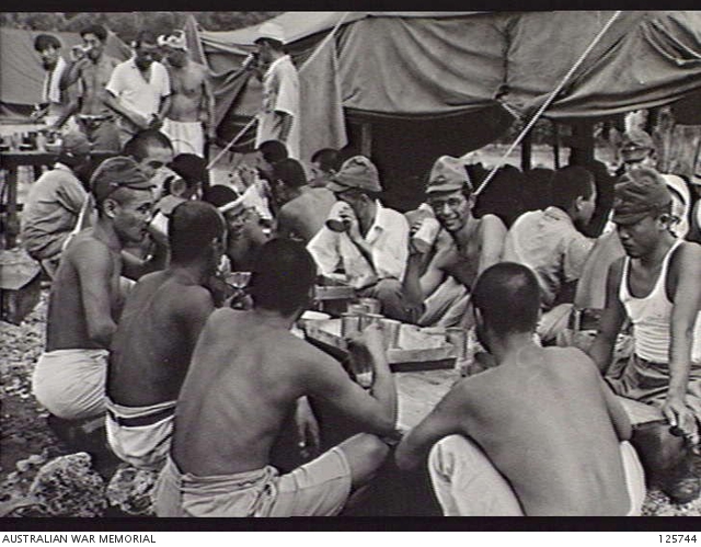 KOEPANG, TIMOR. 1946-02-07. SUSPECTED JAPANESE WAR CRIMINALS SQUATTING ...
