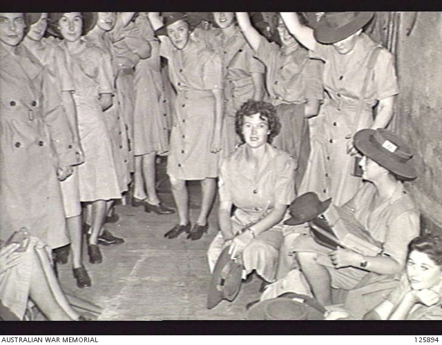 DARWIN, NT. 1946-02-28. A GROUP OF NORFORCE AWAS PERSONNEL IN A TRUCK ...