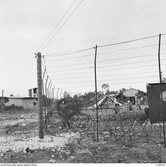 EMERY POINT, DARWIN, NT. 1946-02-27. JAPANESE PRISONERS OF WAR BEHIND ...