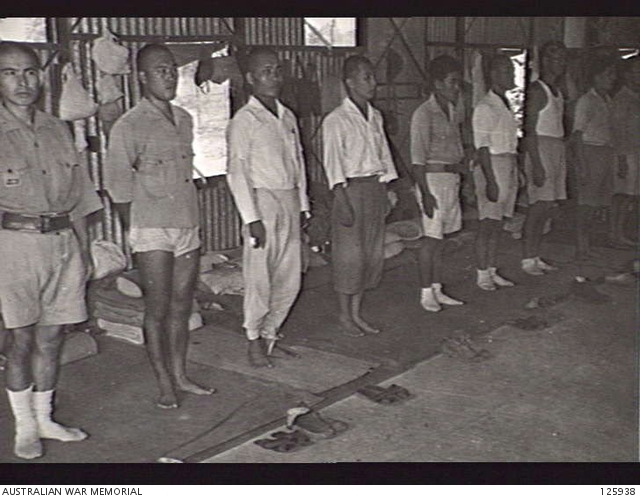 EMERY POINT, DARWIN, NT. 1946-02-27. JAPANESE PRISONERS OF WAR LINED UP ...