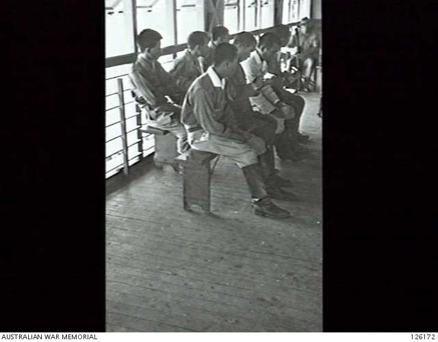 DARWIN, NT. 1946-03-07. JAPANESE ACCUSED OF WAR CRIMES SIT IN THE COURT ...
